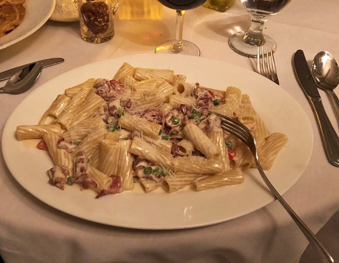 Rigatoni Carbonara that captures the essence of Italian cooking philosophy: few ingredients, treated with respect, creating something greater than their sum.