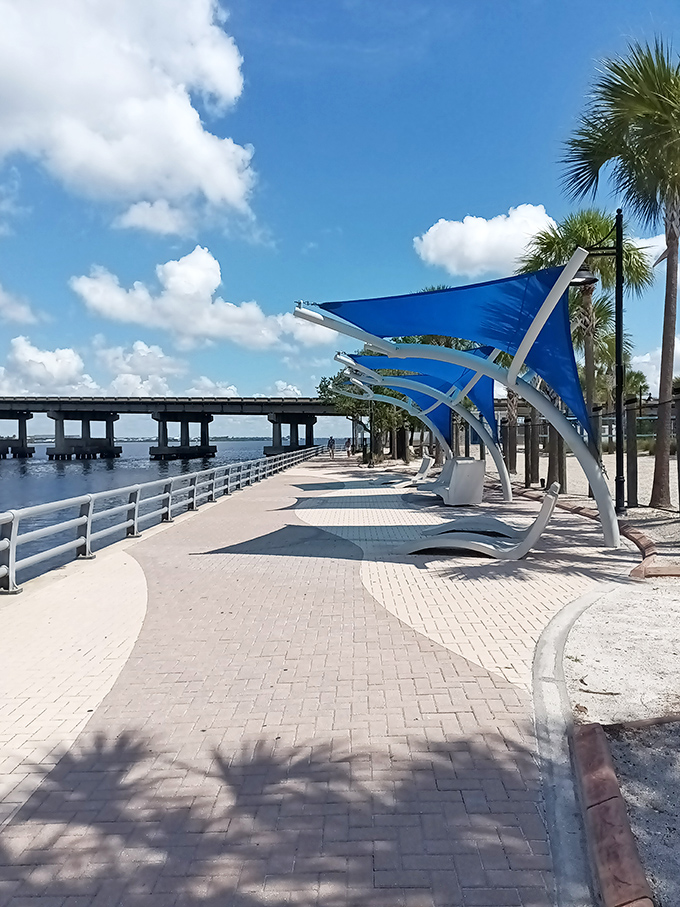 Bradenton's Riverwalk offers shaded respite from the Florida sun. Those blue sail structures are architectural showoffs—and we're grateful for it.
