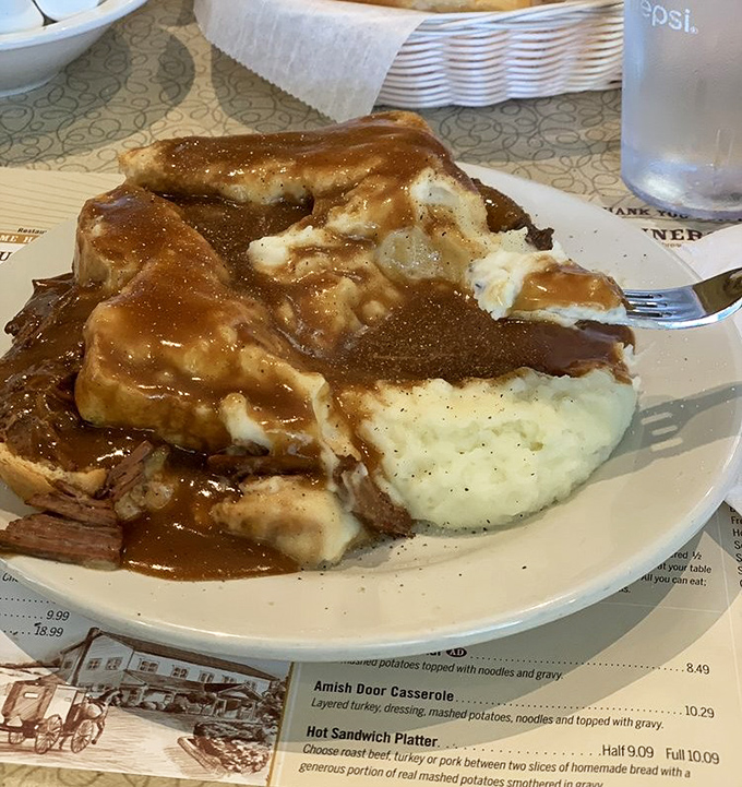 The hot roast beef platter doesn't just come with gravy—it practically bathes in it. This isn't a meal; it's a celebration of what happens when meat meets potatoes.