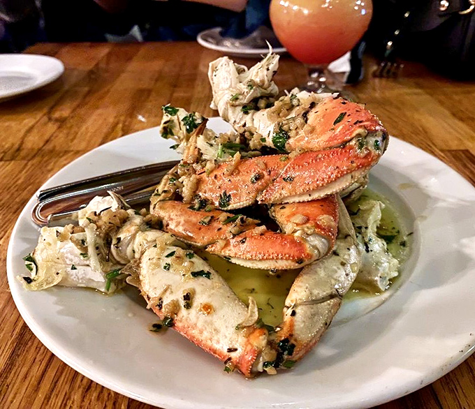Garlic-roasted Dungeness crab—where butter meets sea treasure in a delicious rendezvous that requires both napkins and commitment.