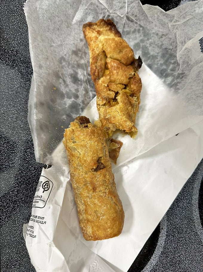 This sausage roll isn't just street food—it's a masterclass in pastry engineering. Flaky, buttery, and utterly irresistible.