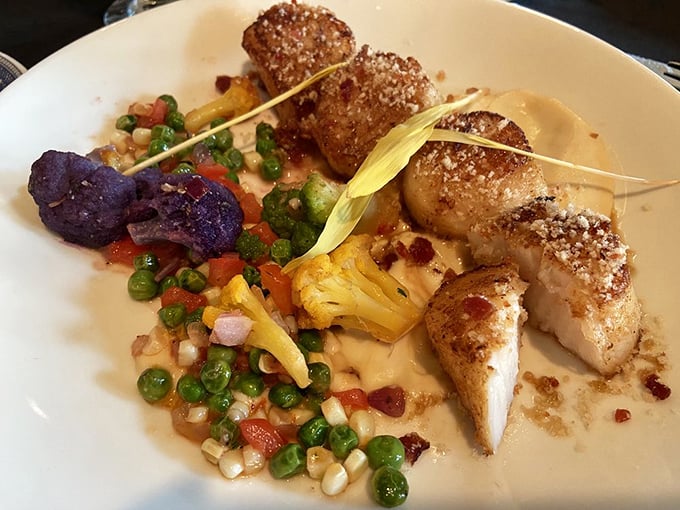 These scallops are the Meryl Streep of seafood—consistently excellent, perfectly golden, and surrounded by a colorful supporting cast.