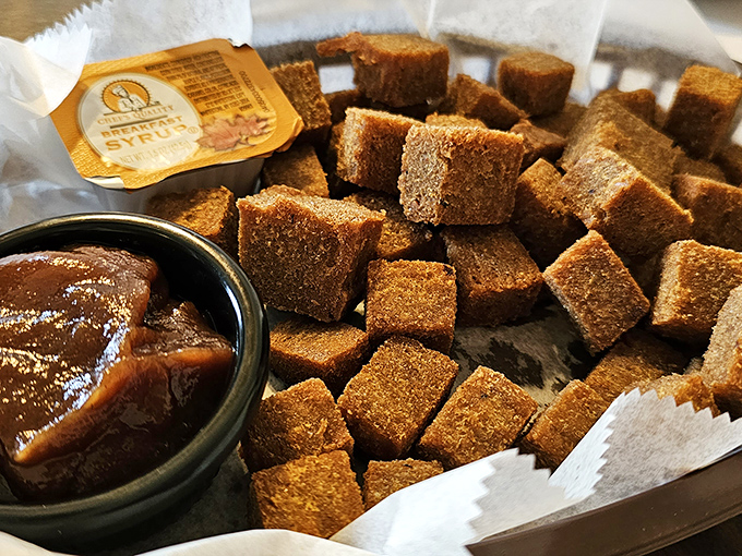 Scrapple bites – those crispy-edged, savory morsels of Pennsylvania Dutch ingenuity – paired with apple butter that transforms the humble into the heavenly.