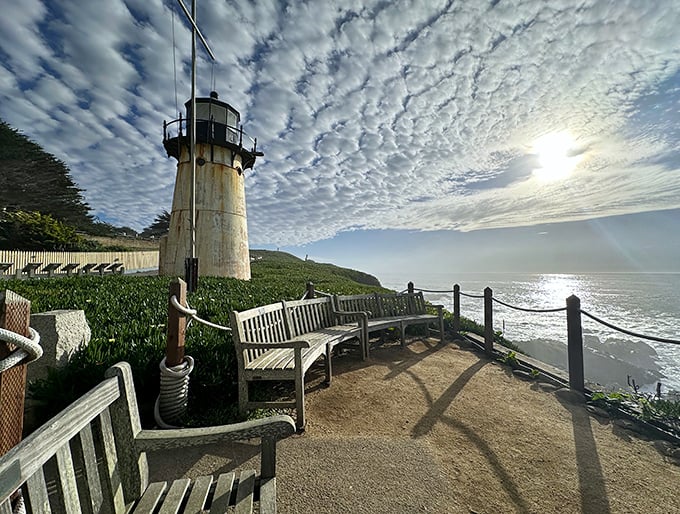 Wooden benches positioned for maximum ocean drama. Bring coffee at sunrise or wine at sunset—either way, you've scored the best seats in California.