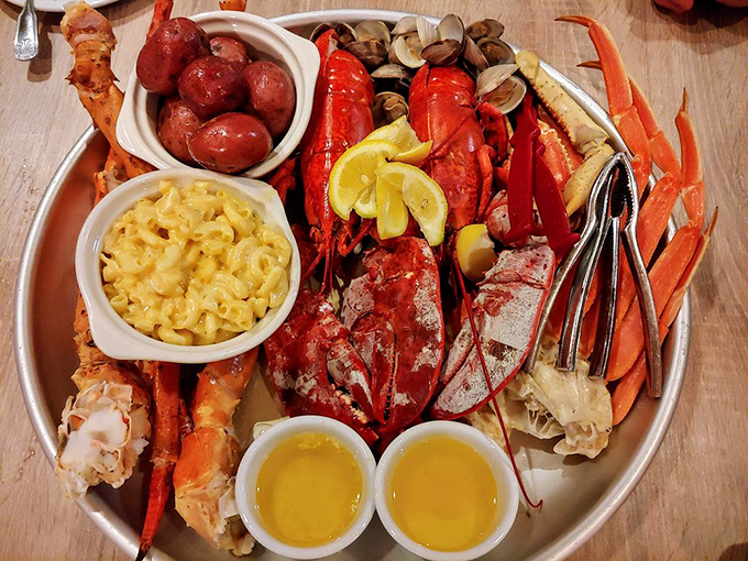 The seafood platter that makes you question whether you should have brought more friends or a bigger appetite—lobster, crab legs, and all the fixings.