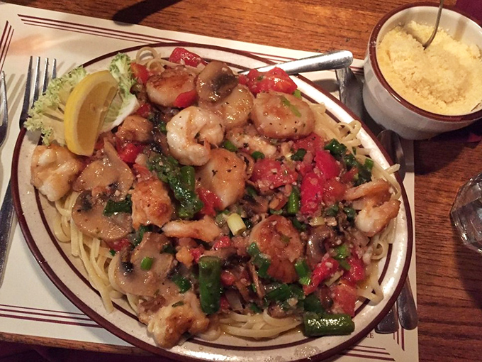 Pasta playing the supporting role to perfectly sautéed shrimp and vegetables—a seafood symphony where every bite hits the right note. 
