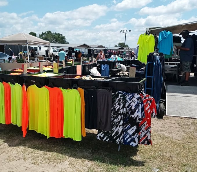 The neon shirt section – where visibility meets fashion in a dazzling array that would make even Miami Vice detectives shield their eyes.