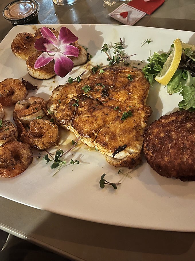This plate is Florida's greatest hits album—featuring blackened fish, plump shrimp, and a crab cake that deserves its own spotlight and standing ovation.