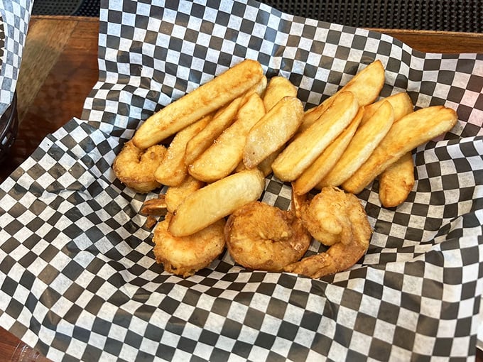 The classic pairing of golden shrimp and crispy fries—like Fred and Ginger, they just belong together. Simple perfection needs no explanation.