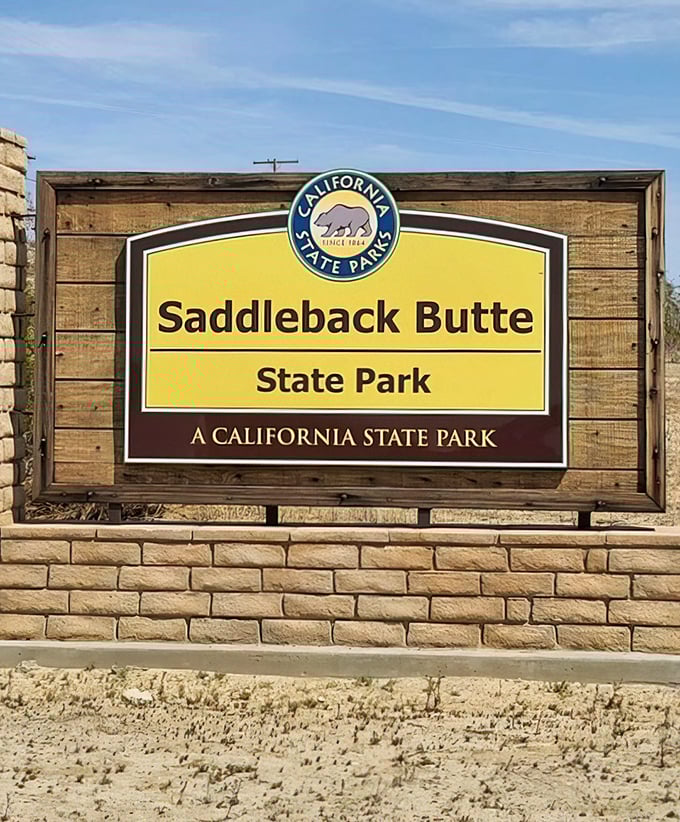 The official welcome sign—where the Mojave Desert rolls out its sandy carpet and invites you to explore its rugged charms.