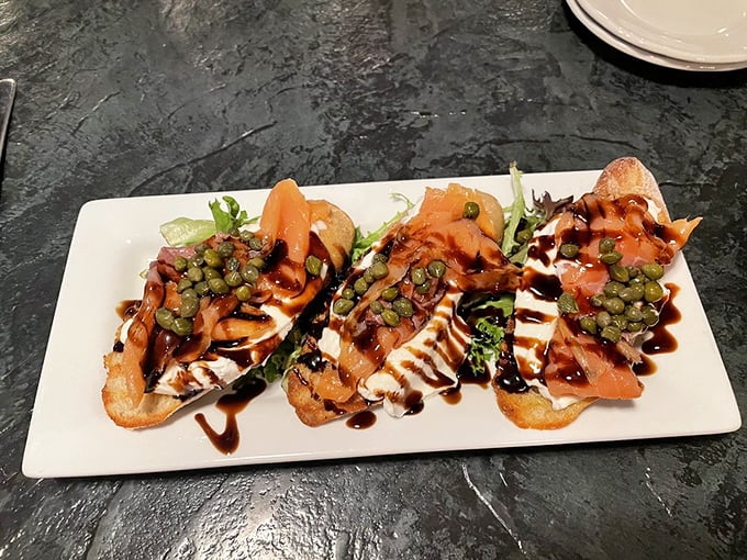 Smoked salmon bruschetta that's dressed to impress—like the culinary equivalent of showing up to a party in your finest outfit, ready to be the center of attention.