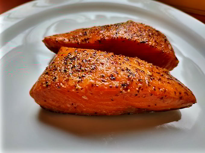 Smoked salmon so perfectly cooked it looks like it's blushing from all the compliments it's about to receive.