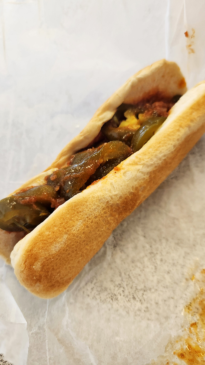 The Spanish Dog—where a humble hot dog vacationed in flavor country and came back transformed. Those grilled peppers mean business.