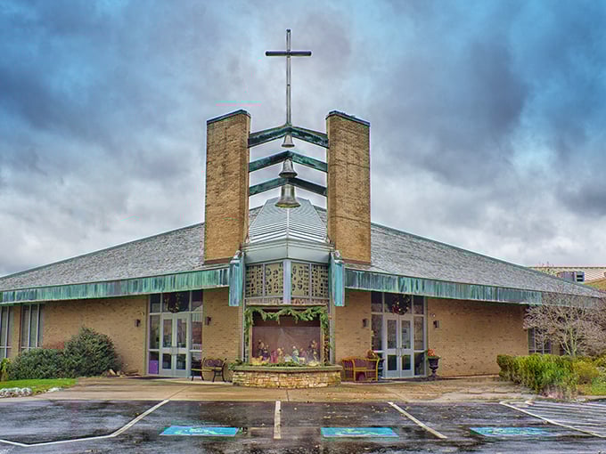 St. Gregory's modern architecture reaches skyward, its distinctive bell tower and cross standing sentinel against moody Pennsylvania skies.