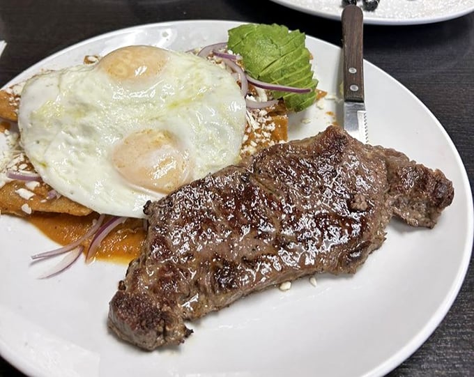 Steak and eggs—the breakfast of champions or the lunch of legends? Either way, that sunny-side up egg is winking at you with delicious possibility.