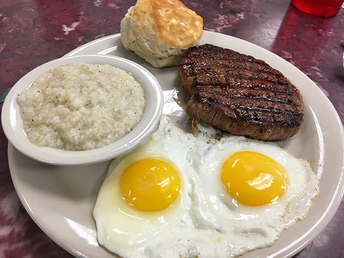 Steak and eggs with creamy grits: when you need breakfast that means business and delivers on every promise.