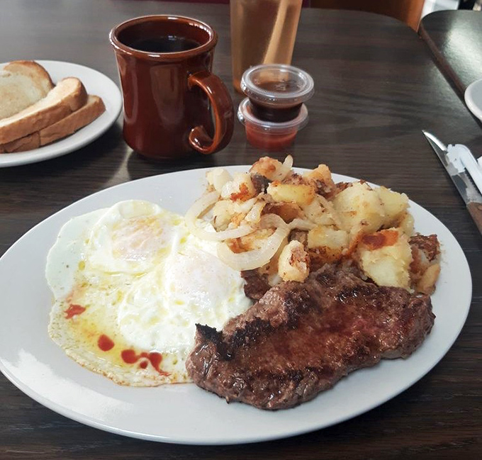 The breakfast of champions isn't cereal—it's this perfect trifecta of steak, eggs, and potatoes that turns ordinary mortals into superheroes before noon.