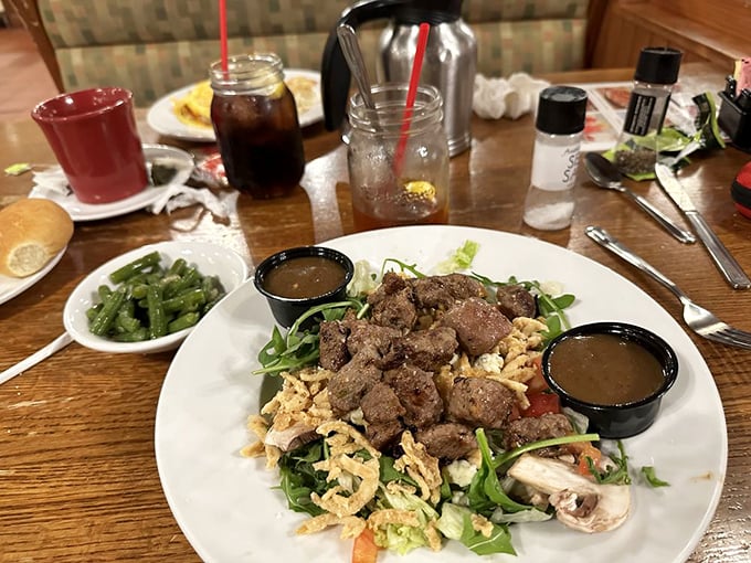 A steakhouse salad that proves healthy eating doesn't have to be punishment – those steak bites are the reward for all those greens.