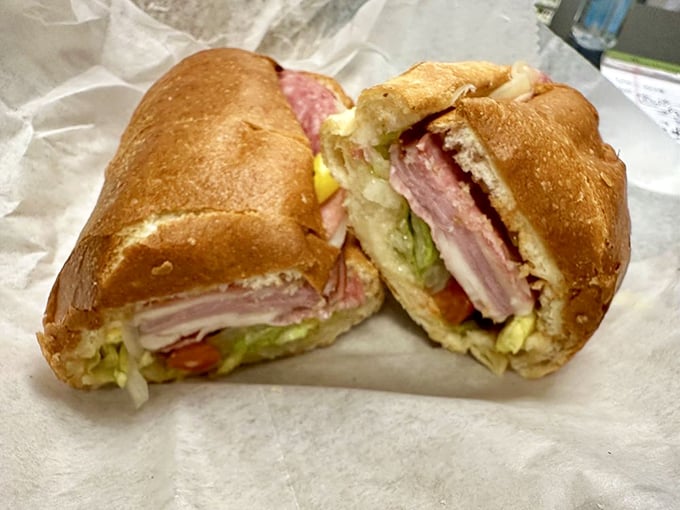 The Italian sub—where every ingredient knows its role and plays it perfectly. This is sandwich democracy at its finest.