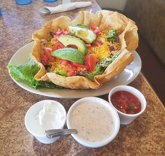 Not your average taco salad—this edible bowl cradles fresh ingredients with the tender care of a parent holding their firstborn. Three dipping sauces because choices matter.