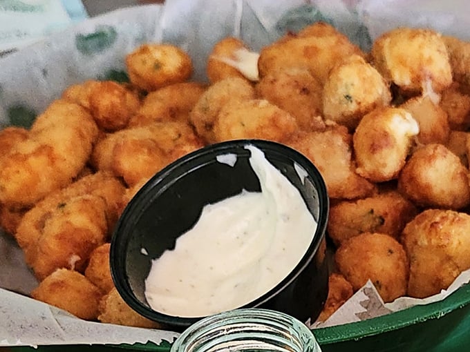 These aren't just tater tots—they're little golden nuggets of potato perfection that somehow taste even better in a 150-year-old cellar.