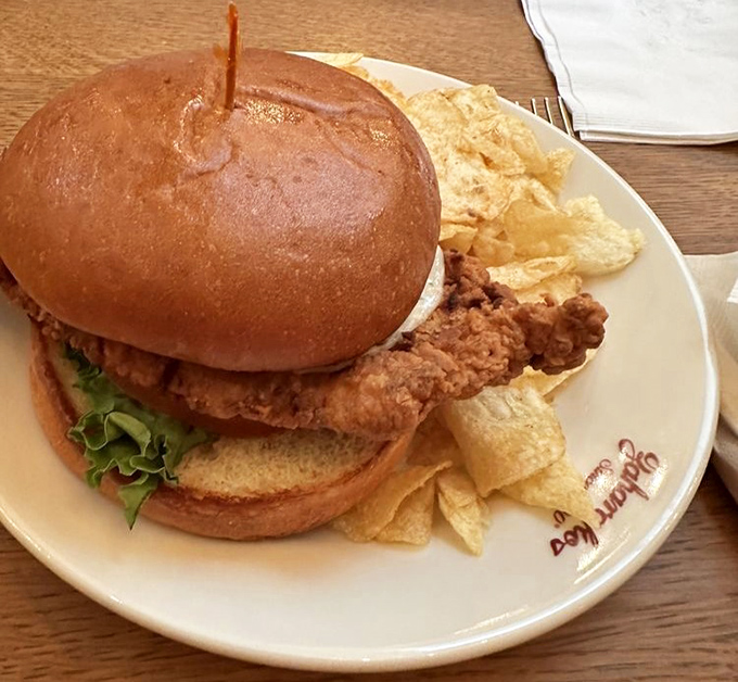 That's not just a tenderloin sandwich – it's Indiana's unofficial state food, served with a side of nostalgia and perfectly crispy chips.