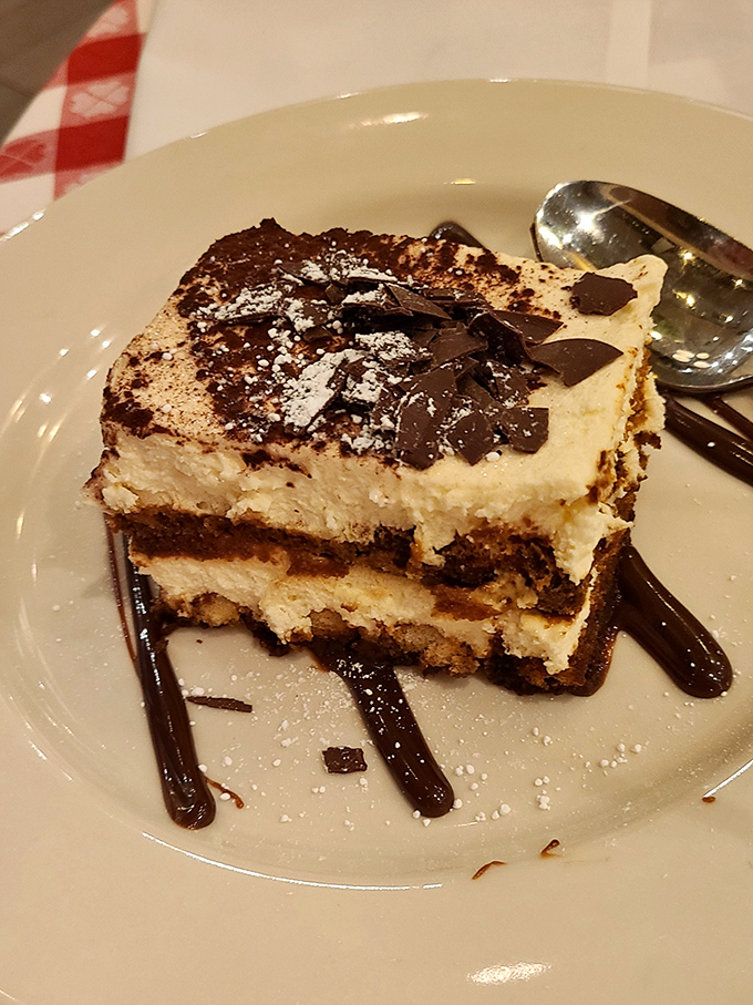 This tiramisu doesn't just have layers, it has chapters – a dessert autobiography told in espresso-soaked ladyfingers and mascarpone cream.