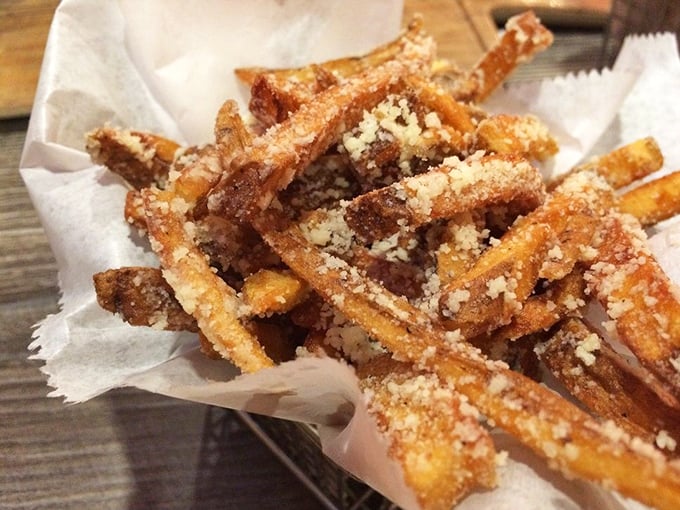 Parmesan-dusted fries that make regular fries look like they're not even trying. The crispy-to-fluffy ratio is mathematical perfection.