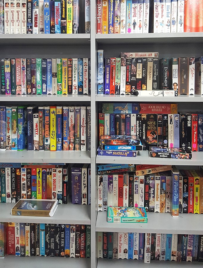 The VHS collection—a time capsule of movie nights past. Remember when "be kind, rewind" was our social contract?