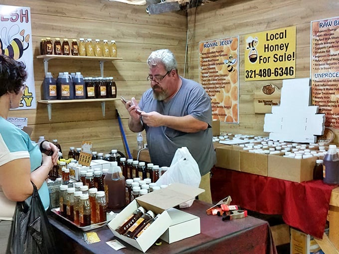 Local honey vendors create sweet connections with customers, offering liquid gold harvested from Florida's diverse flora—nature's bargain in every jar.