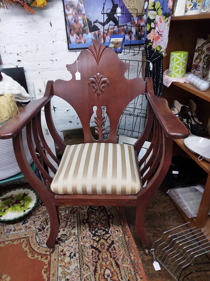 This ornate wooden chair isn't just seating—it's a throne waiting for its rightful owner. The carved details practically whisper, "Yes, you DO deserve this."