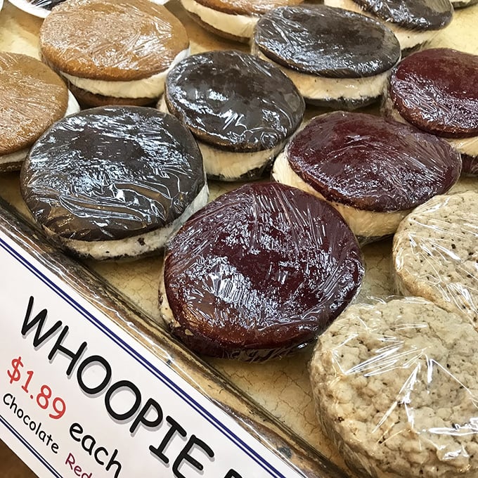 Whoopie pies lined up like edible hockey pucks of joy—chocolate, vanilla, and red velvet versions all vying for your attention.