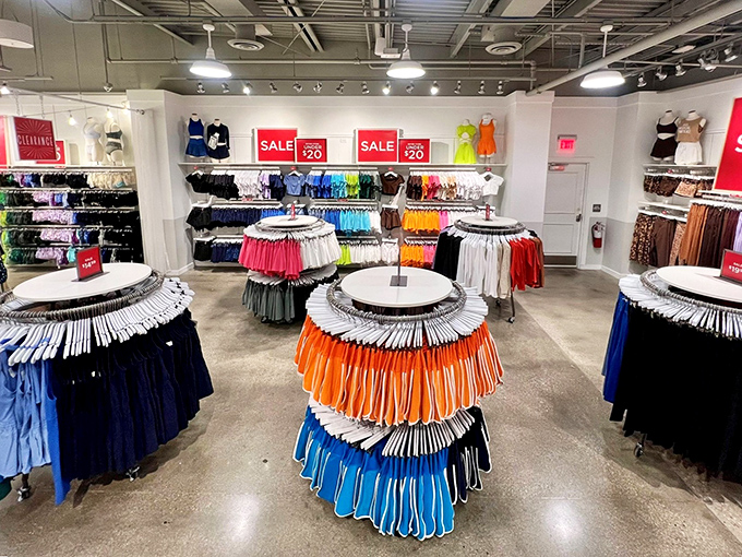 A color wheel of athletic wear arranged with mathematical precision—like a retail color theory class where every hue promises to make you look fabulous.