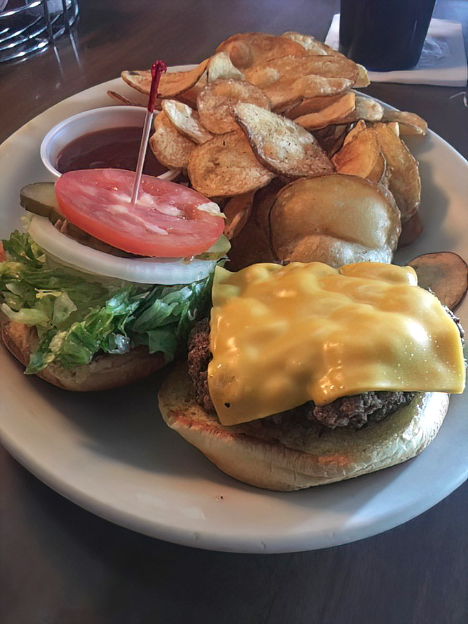A cheeseburger with house-made chips that doesn't need truffle oil or a fancy name—just quality ingredients and decades of burger-making wisdom.