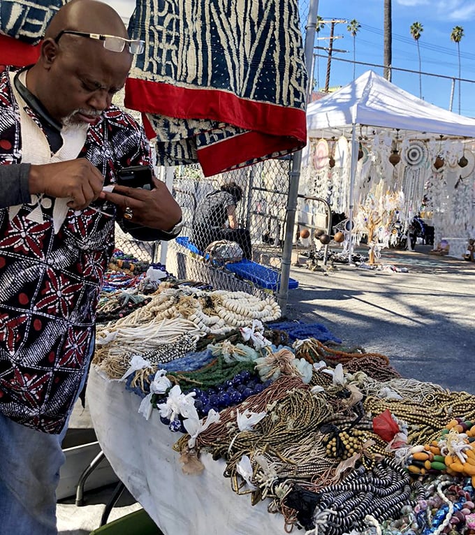 This jewelry vendor's treasure chest would make pirates weep with envy over such sparkling bounty.