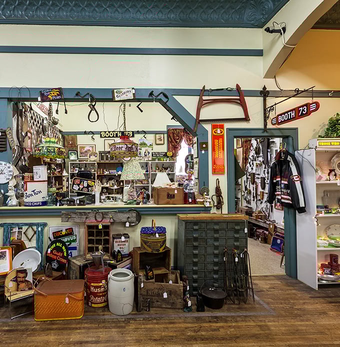 Booth 73 is where rustic Americana meets vintage advertising. That Huston's Potatoes crock probably has stories that would make a novelist jealous.