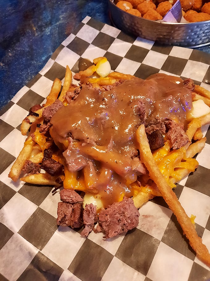 Brisket fries—where potatoes fulfill their destiny by becoming a throne for tender smoked meat and cheese. Diet plans weep silently in the corner.
