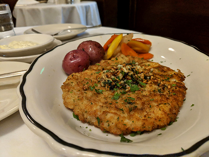 The legendary calamari steak—golden, crisp, tender within. This isn't bar food; it's the reason San Franciscans have kept this place in business.