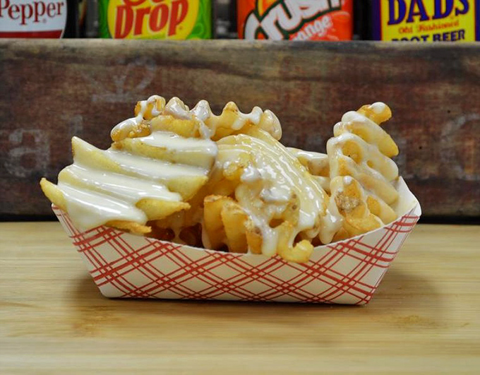 Waffle fries wearing a melted cheese blanket—because regular fries just don't dress up for special occasions.