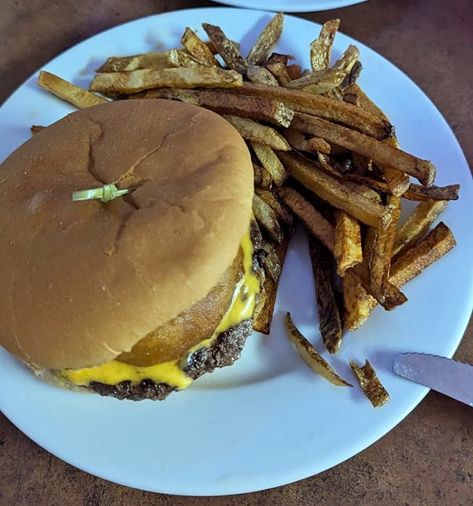Sometimes a burger just needs to be a burger – no fancy garnishes, just melted cheese and pure satisfaction.