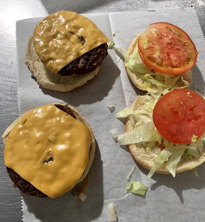 Two cheeseburgers that prove this kitchen doesn't play favorites – everything gets the royal treatment here.