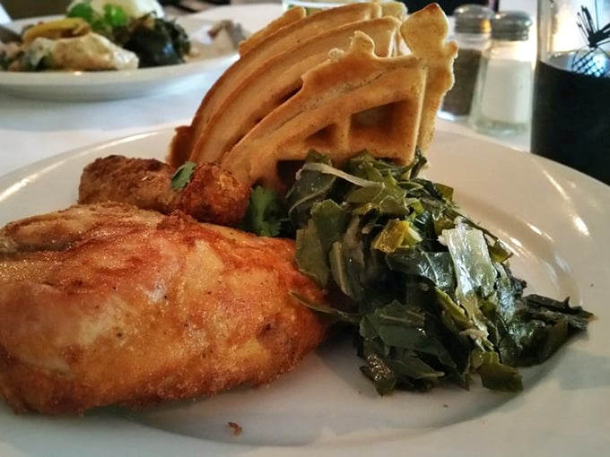 Chicken and waffles with collard greens – the ultimate Southern power couple, bringing together sweet, savory, and soul-satisfying on one magnificent plate.
