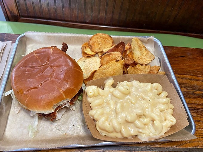 This isn't just another chicken sandwich—it's comfort on a bun. That golden brioche hugging perfectly cooked chicken deserves its own thank-you note.