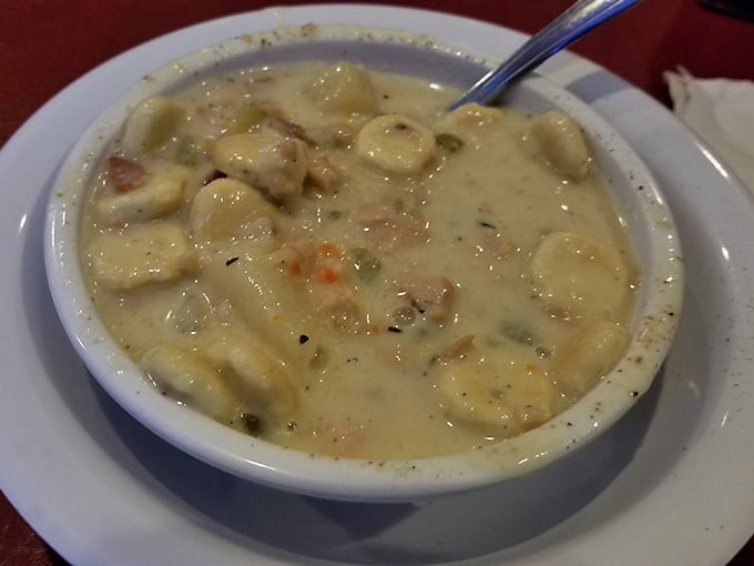 A bowl of clam chowder so creamy and comforting it should come with its own therapist's license and a box of tissues.