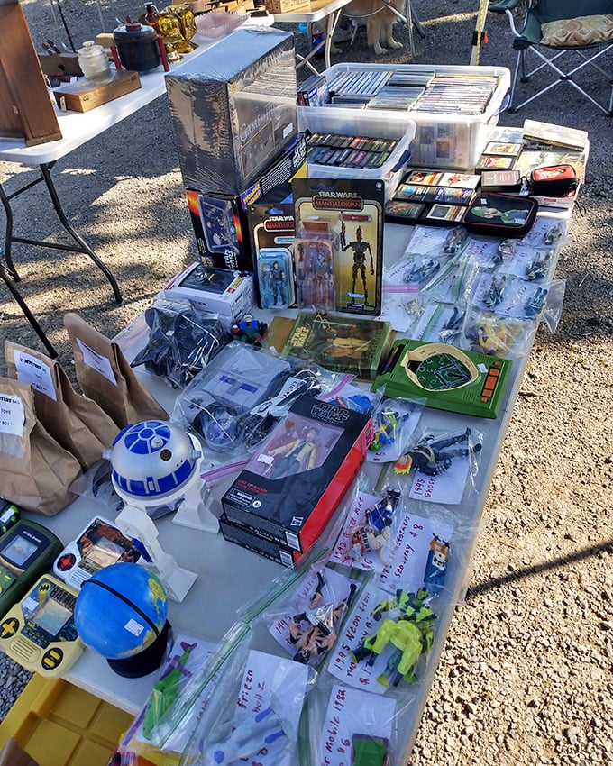 Star Wars meets baseball cards! For collectors, this table is like finding the Millennium Falcon of memorabilia—complete with R2-D2 bubble head.