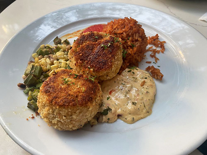 Carolina crab cakes that are mostly crab, barely bound, and perfectly bronzed—served with a sauce that deserves its own fan club.