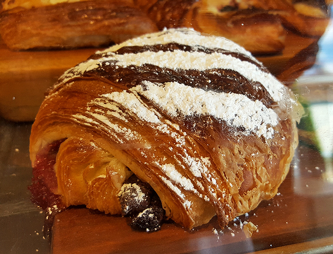 If butter could dream, it would imagine becoming this croissant. Those layers aren't just pastry—they're edible poetry waiting to shatter deliciously.