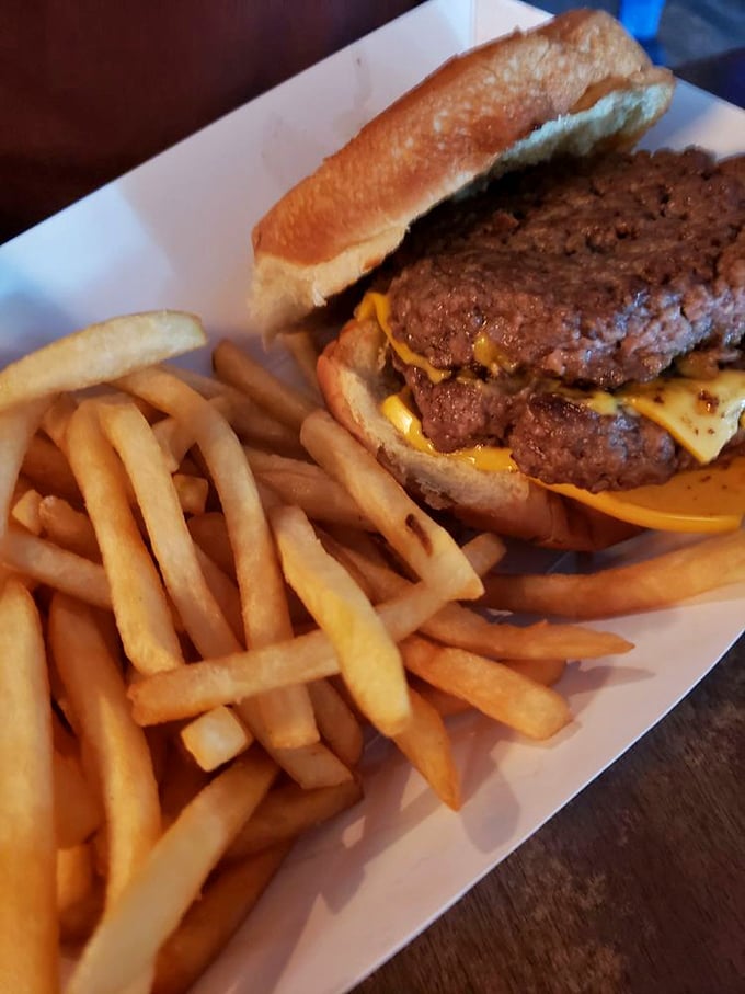 When one patty just won't do, the double cheeseburger steps in like a superhero. Those golden fries aren't sidekicks—they're equal partners in this flavor adventure.