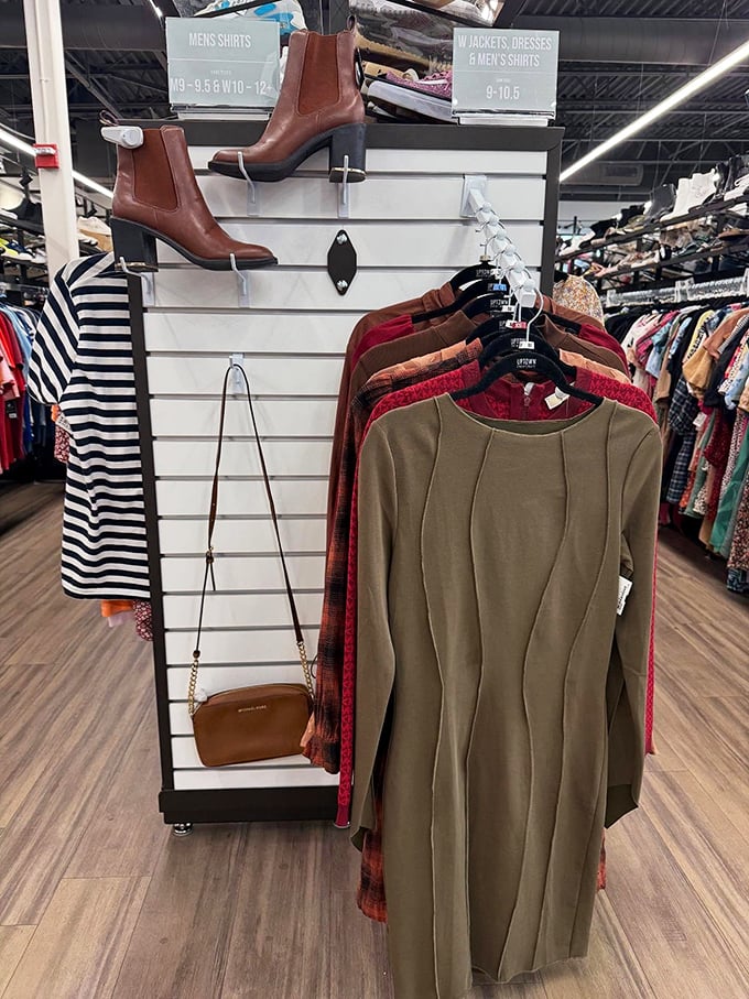A perfectly styled display featuring rich autumn tones, classic Chelsea boots, and a Michael Kors crossbody—the secondhand trifecta.