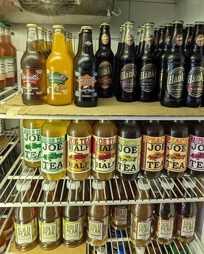 The beverage cooler at Earl's is a nostalgic treasure trove—Hank's root beer and Joe Tea might just transport you back to simpler times.